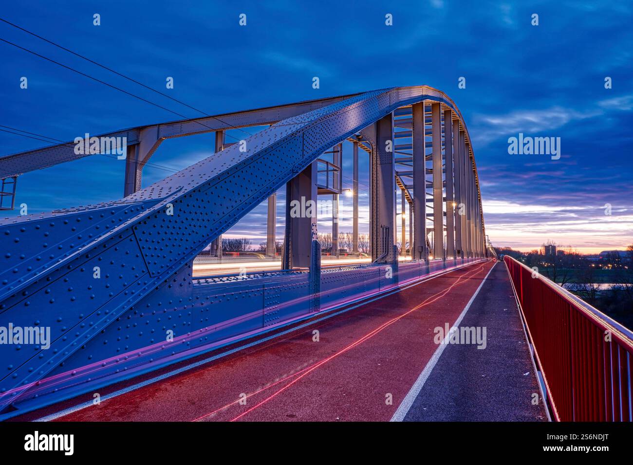 On the historic bridge in Arnhem at the blue hour Stock Photo - Alamy