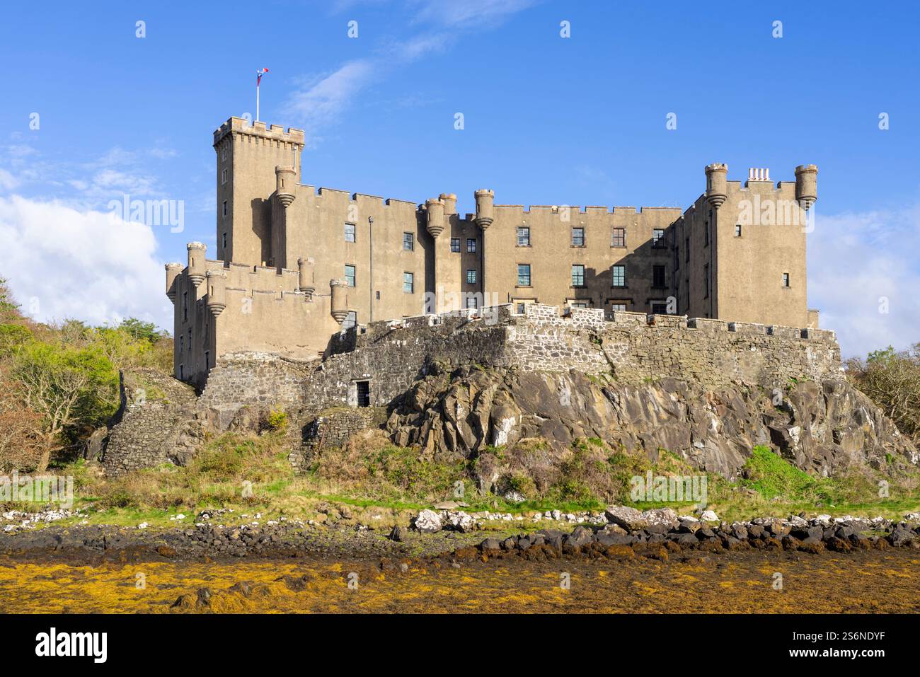 Dunvegan castle on the shores of Loch Dunvegan Isle of Skye Highlands ...