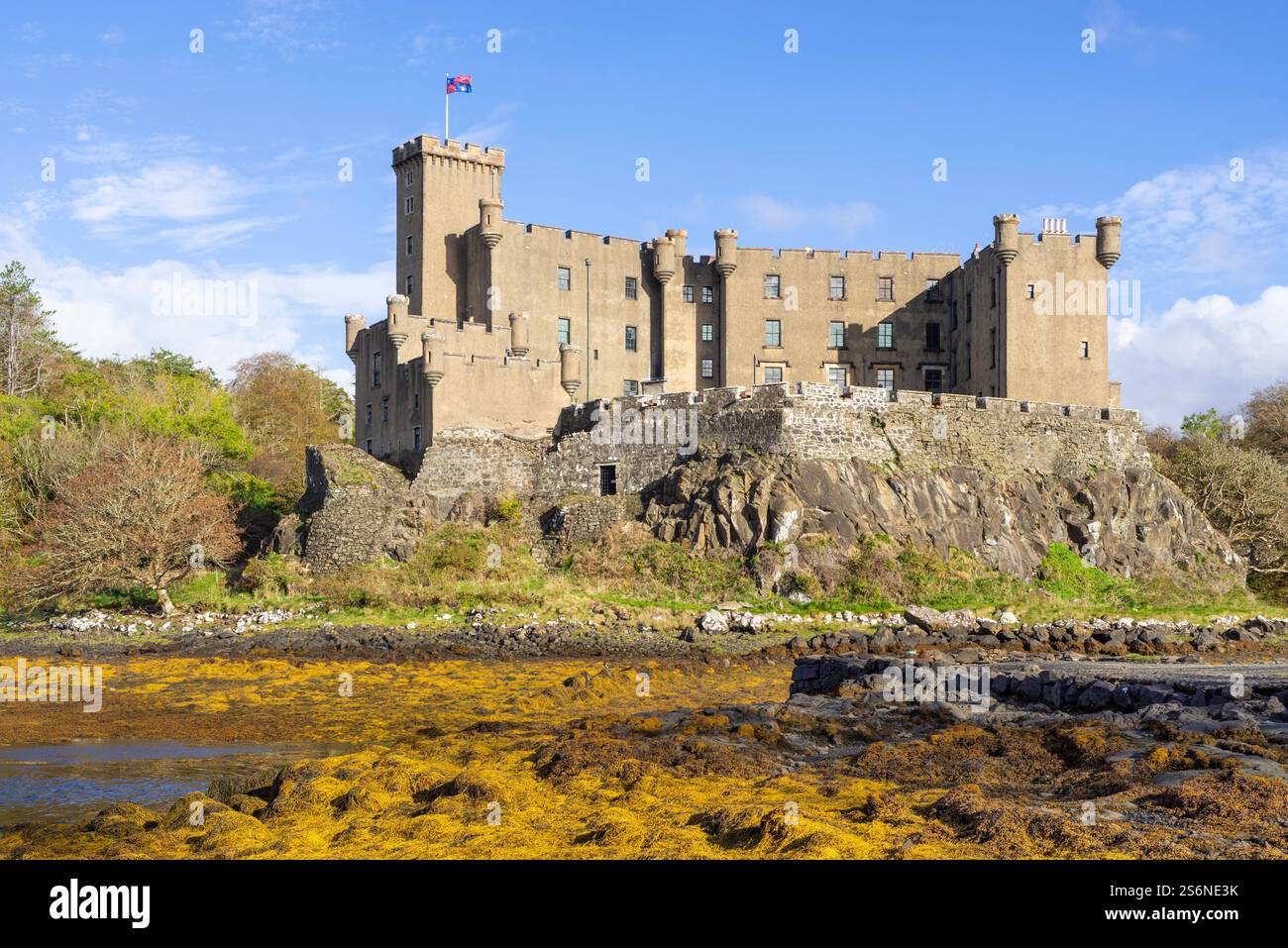 Dunvegan castle on the shores of Loch Dunvegan Isle of Skye Highlands ...