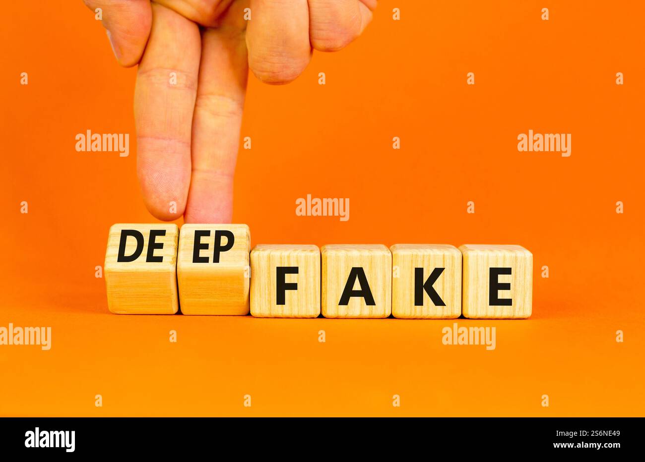Deepfake or fake symbol. Concept words Fake Deepfake on wooden cubes ...