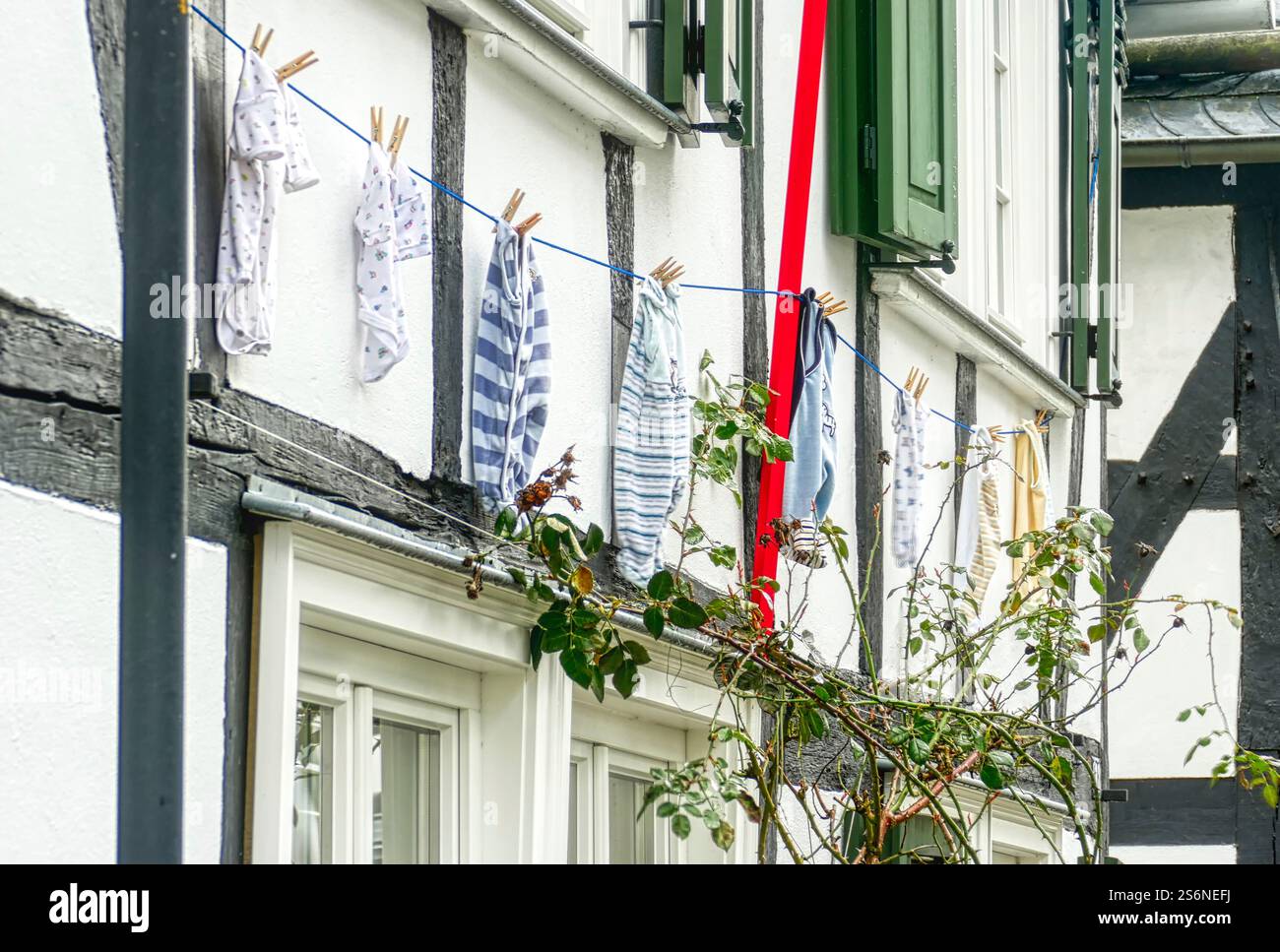 Traditional washing line on a half-timbered house in the old town of ...