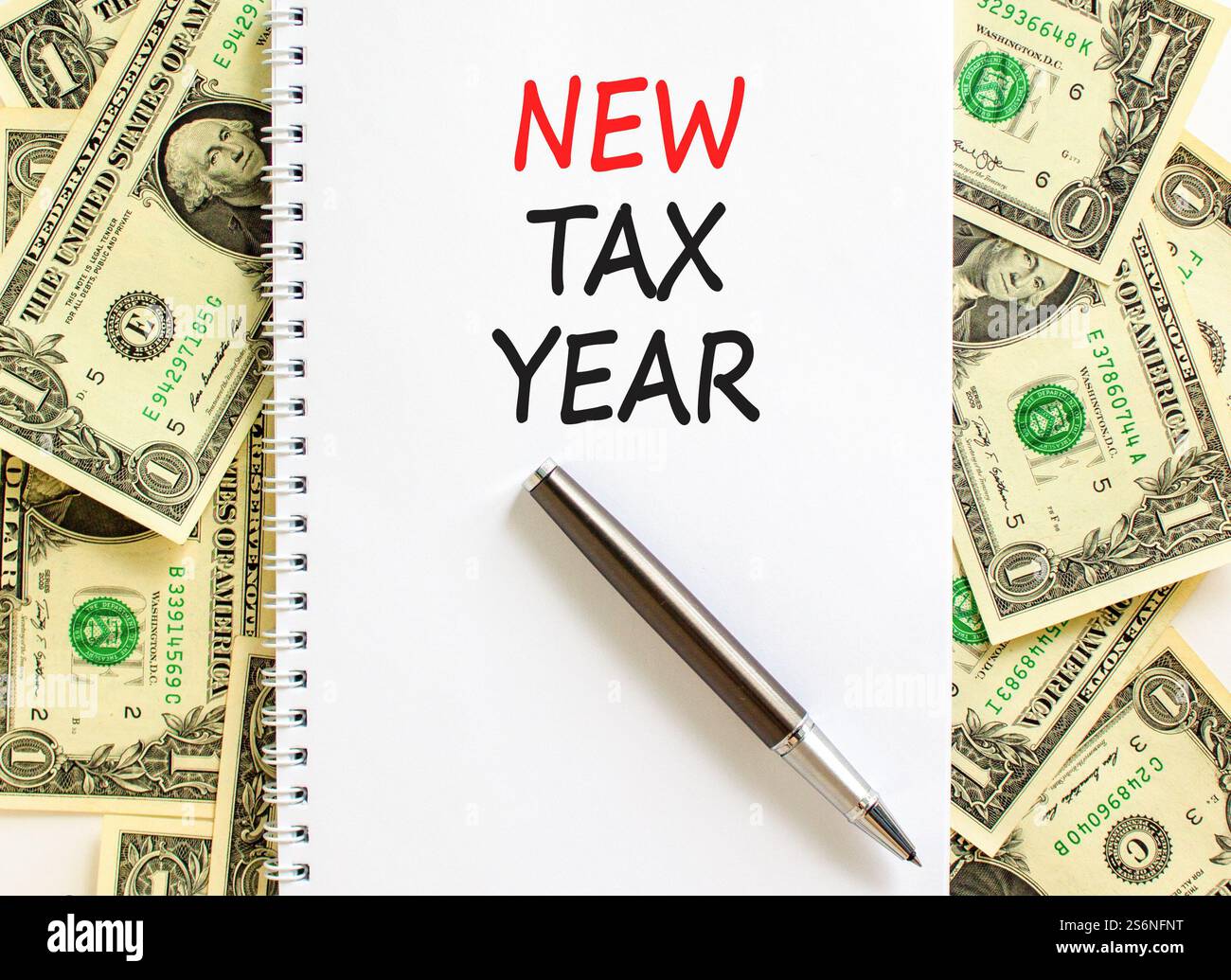 New tax year symbol. Concept words New tax year on beautiful white note ...