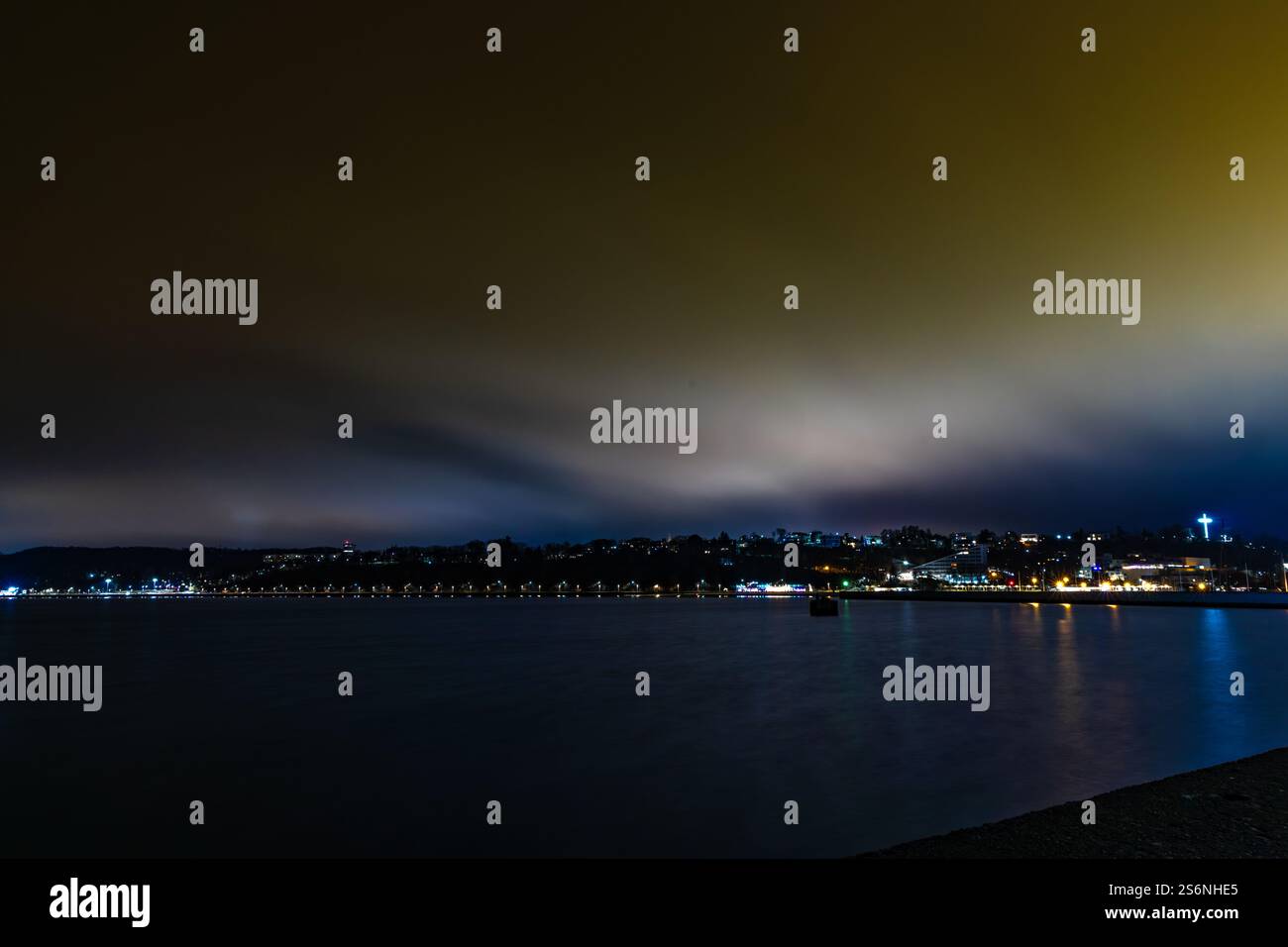 Port quay in Gdynia at night, illuminated ships, city at night ...