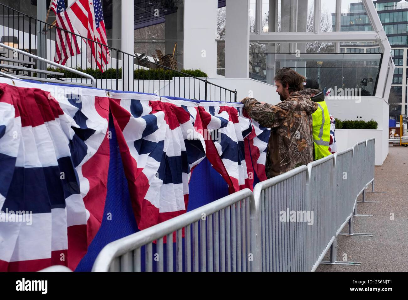 Work continues near the presidential reviewing stand on Pennsylvania ...
