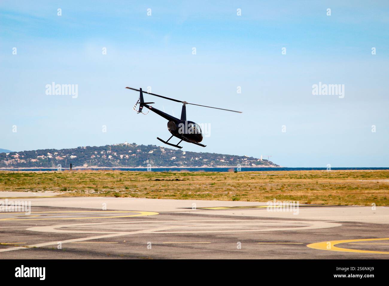 A helicopter taking off Stock Photo - Alamy