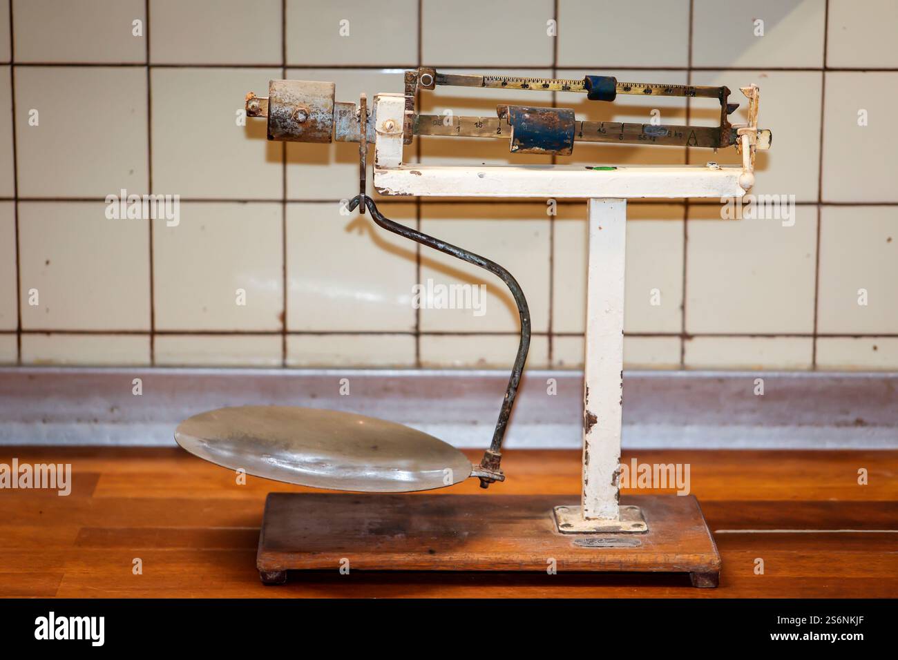 A detail picture of a scale with the weights Stock Photo - Alamy