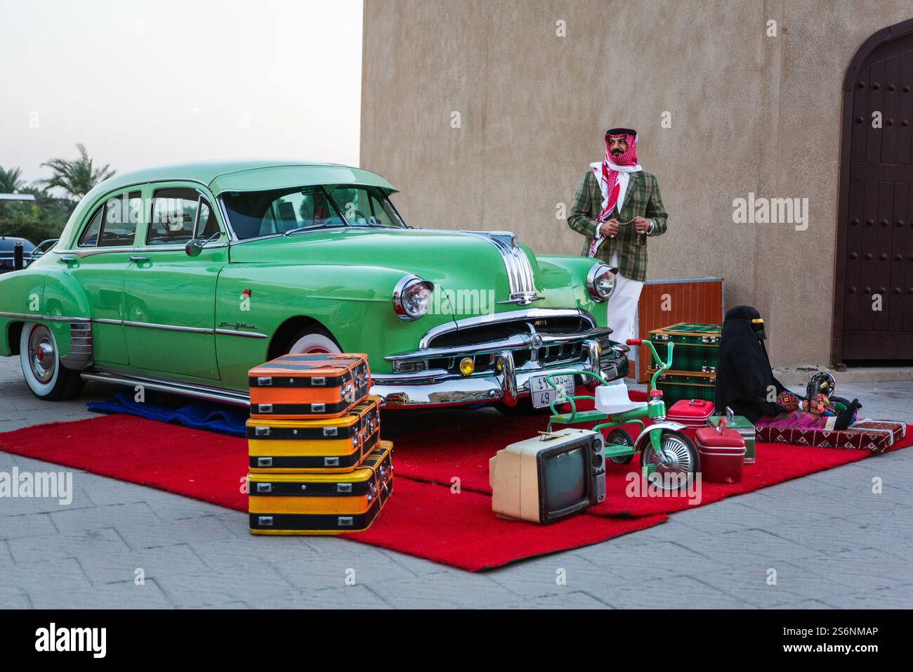 An American classic car from the 1950s in green, parked at the Qatif ...