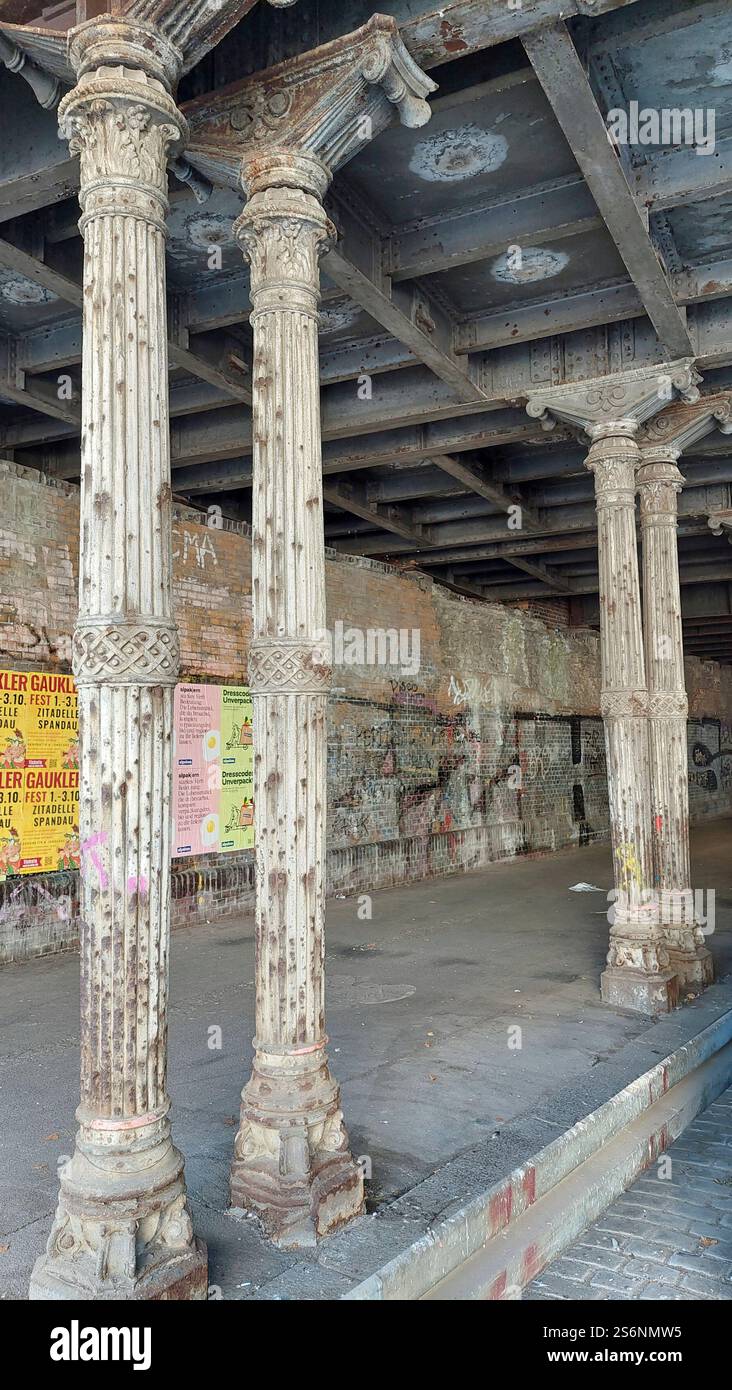 Steel bridge and underpass with cast-iron columns Stock Photo - Alamy