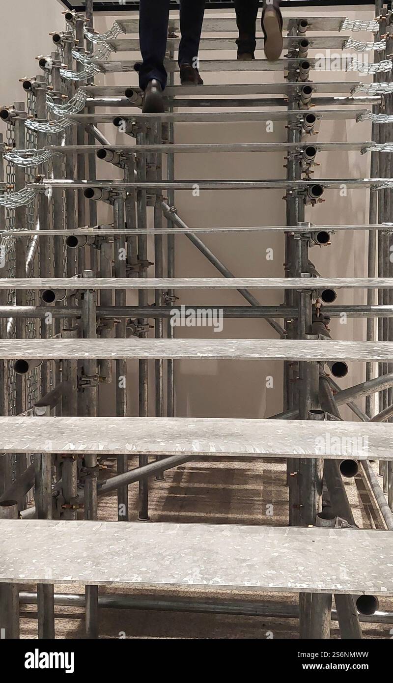 Walking on construction stairs from scaffolding Stock Photo - Alamy