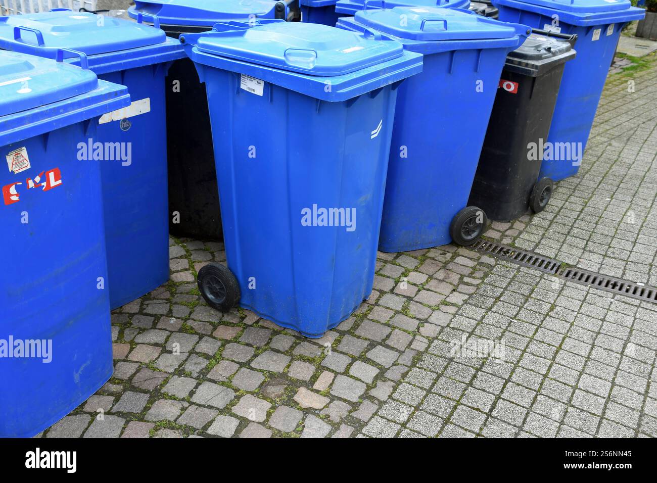 Blue waste paper bins Stock Photo - Alamy