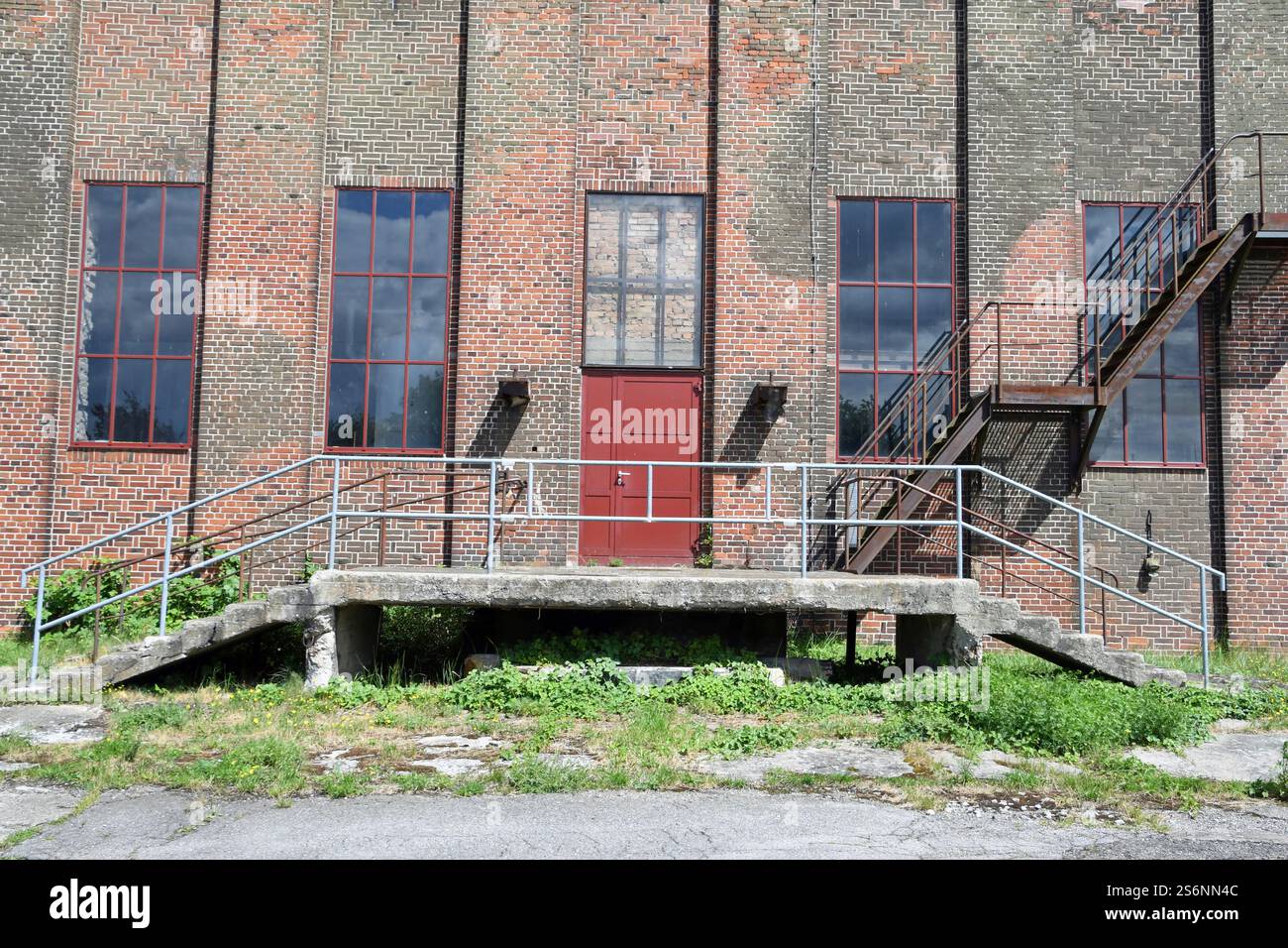 Ramp on brick factory building Stock Photo - Alamy