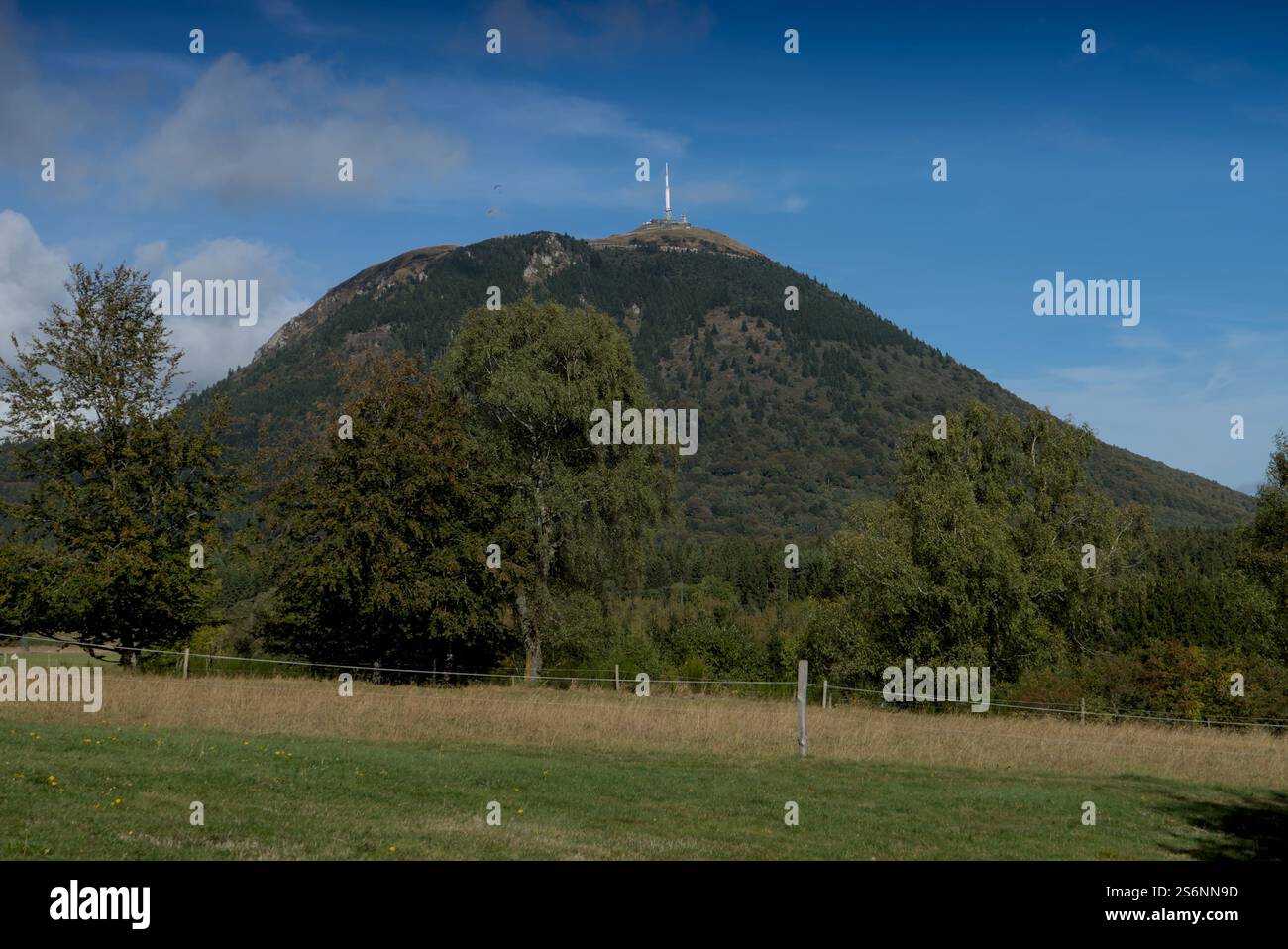 The Puy-de-Dome volcano in spring in Auvergne seen from the paraglider ...