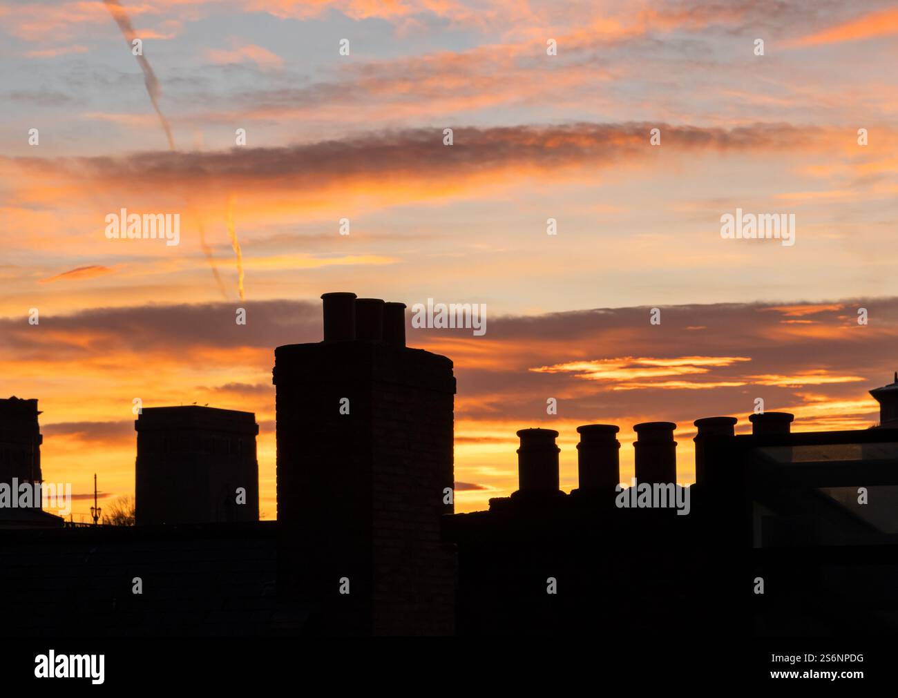 Sunrise over some Chimney Stacks in Newcastle upon Tyne Stock Photo - Alamy