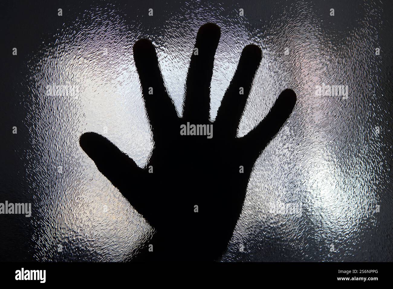 Hand reaches into the void Stock Photo - Alamy