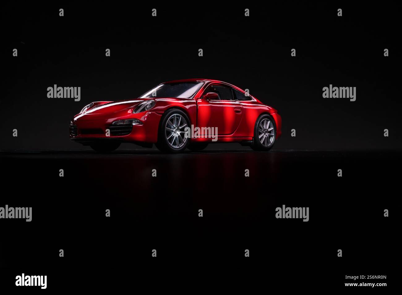 Studio photo of a red model sports car Stock Photo - Alamy