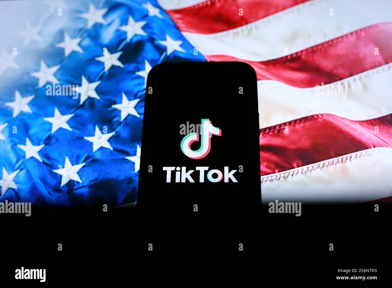 London, UK. 17 January 2025. The TikTok logo is displayed on a mobile phone against the ...