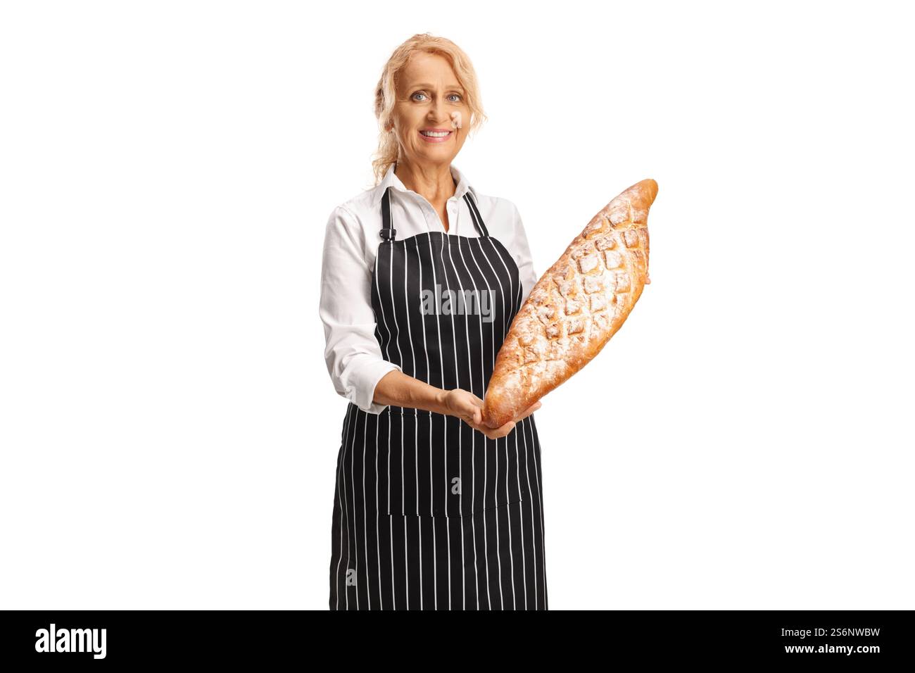 Woman baker holding a big loaf of bread isolated on white background ...