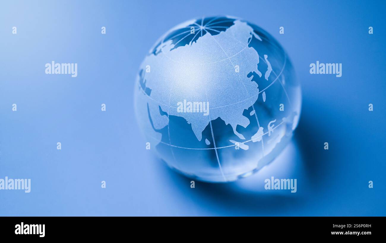 World business finance glass globe map earth ball on blue background ...