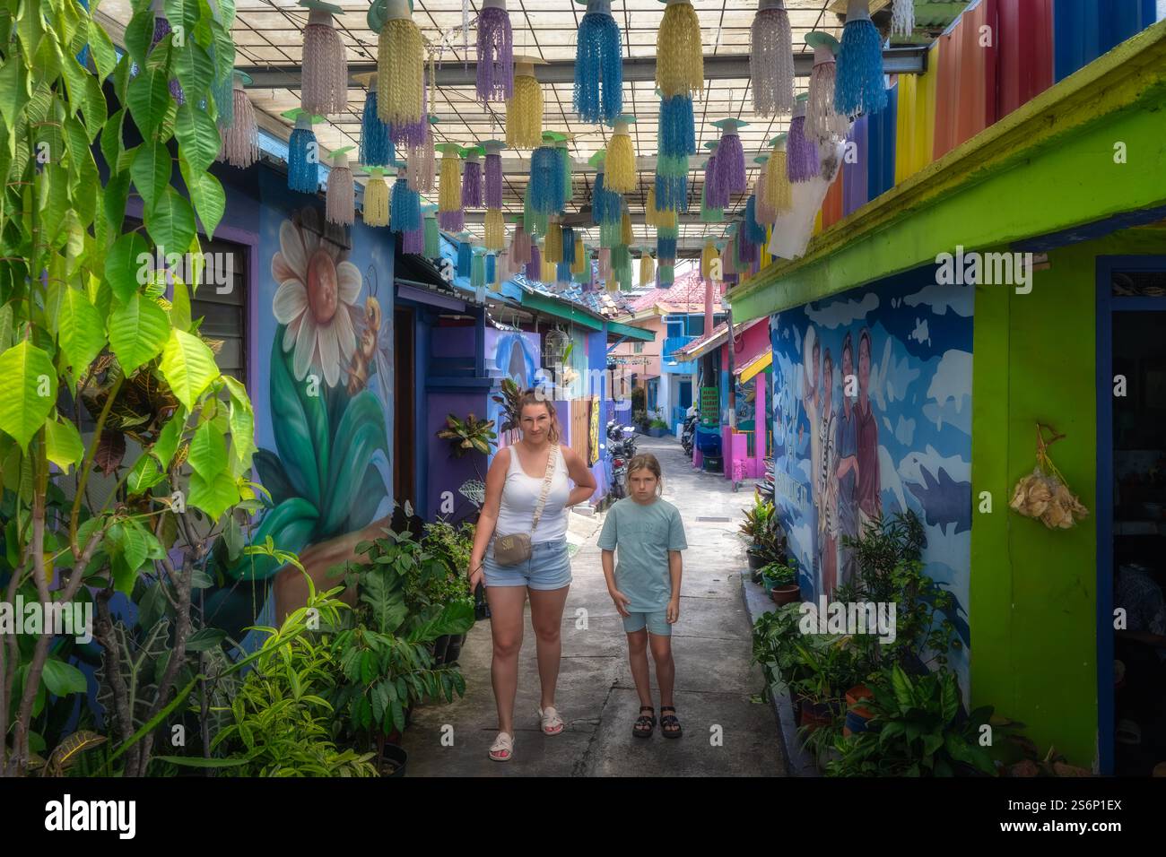 Malang, Java, Indonesia, 2 Oct 2024 A vibrant and colorful alley filled ...