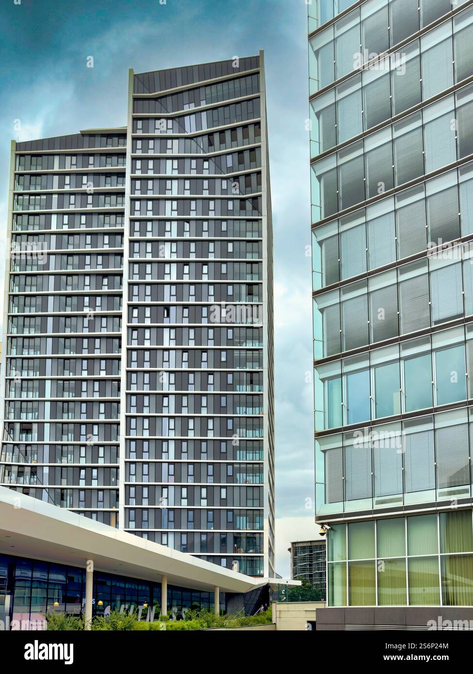 The modern architecture of the Infinity Center, two sculptural towers ...