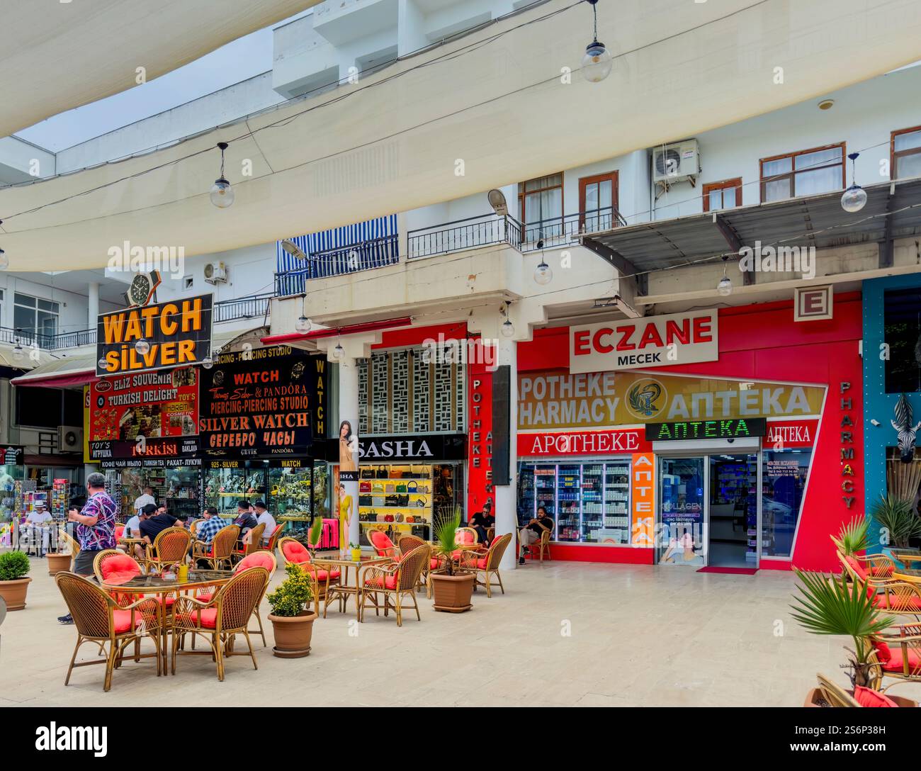 View of the shopping arcade with restaurants, cafe and bar in Belek ...