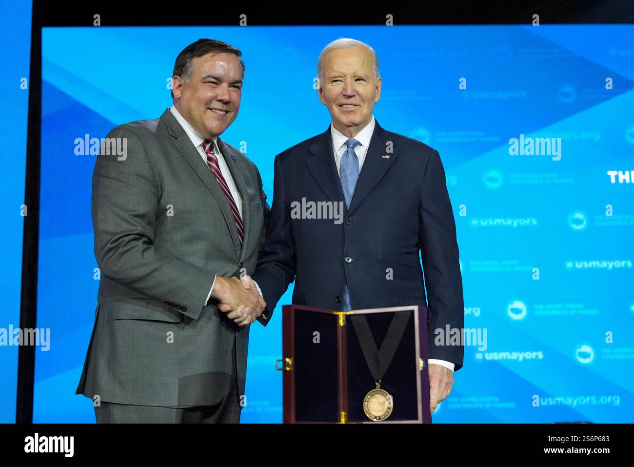 President Joe Biden shakes hands with Columbus (Ohio) Mayor Andrew ...