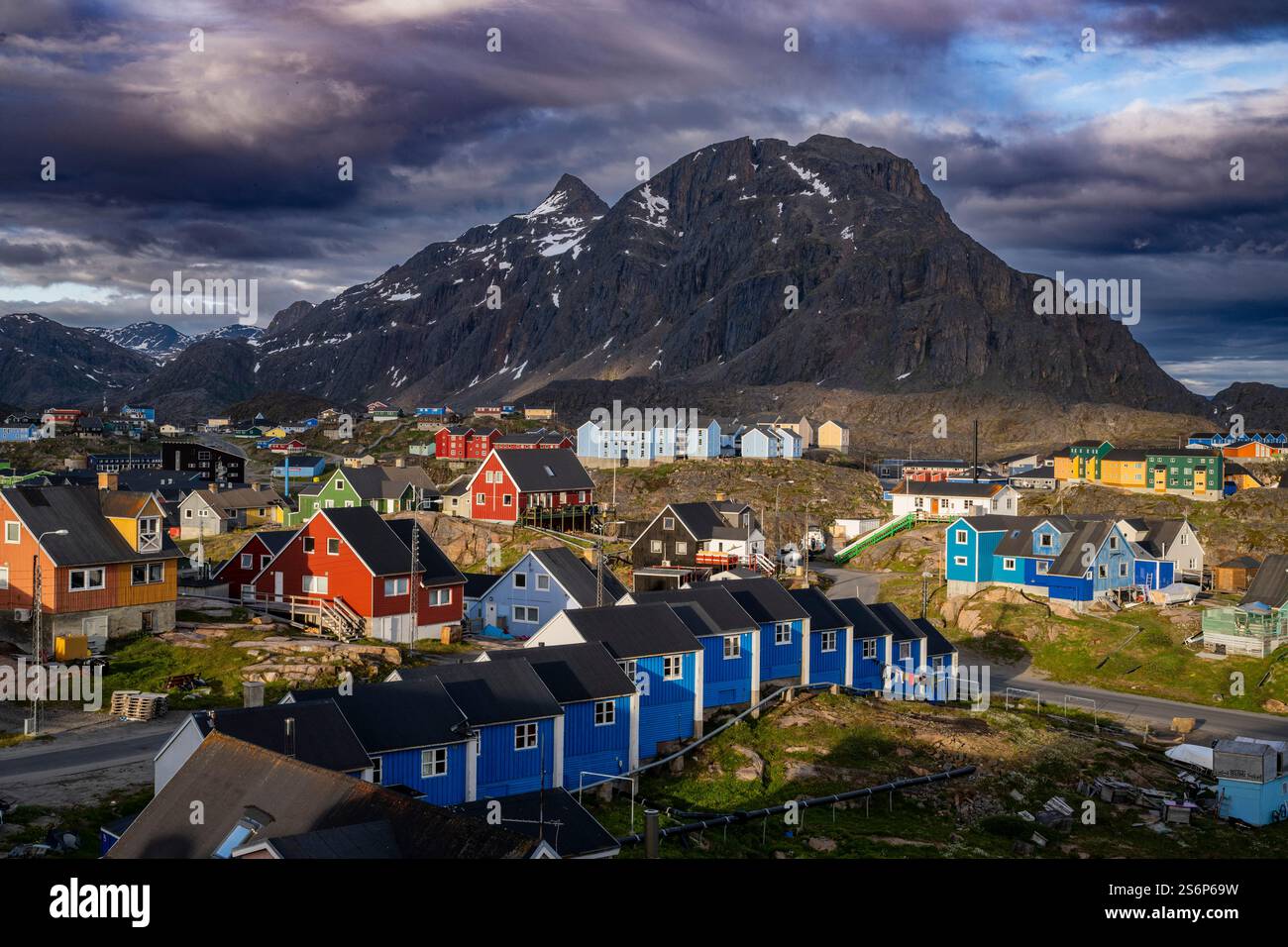 Colorful houses of Sisimiut town contrast beautifully with the rugged ...