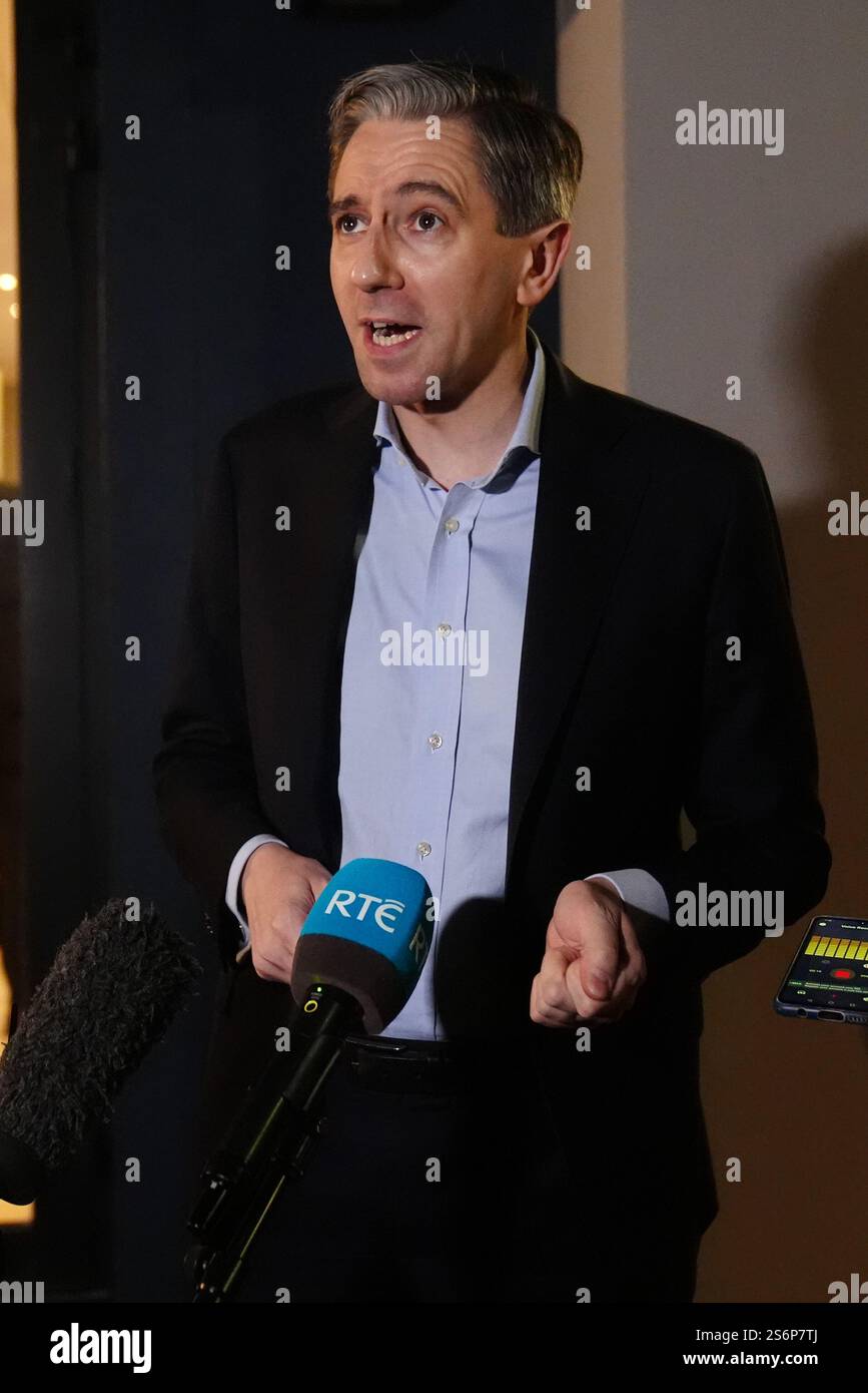 Taoiseach and Fine Gael leader Simon Harris speaks to media as he ...
