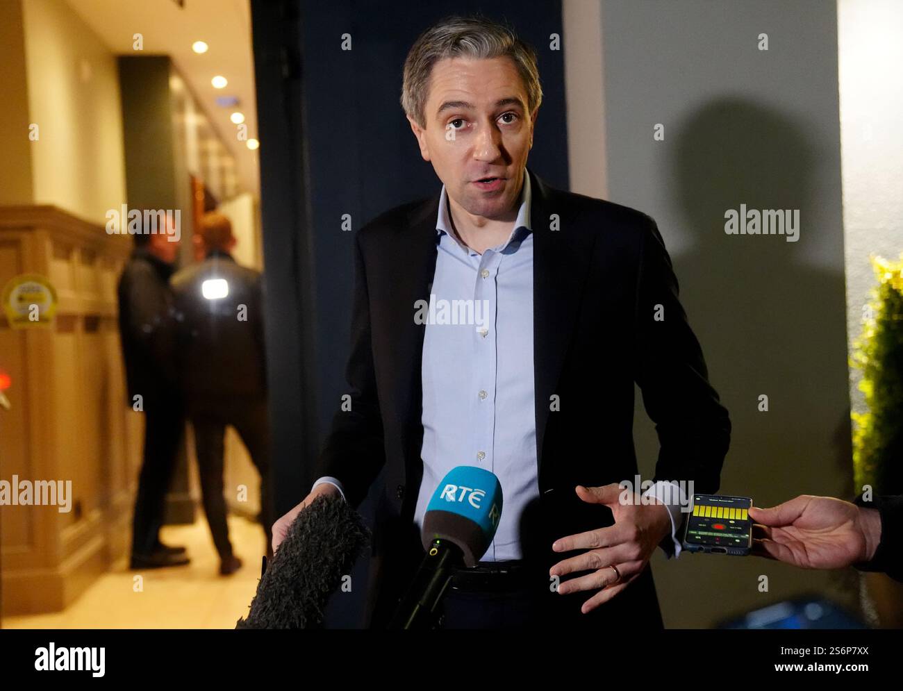 Taoiseach and Fine Gael leader Simon Harris speaks to media as he ...