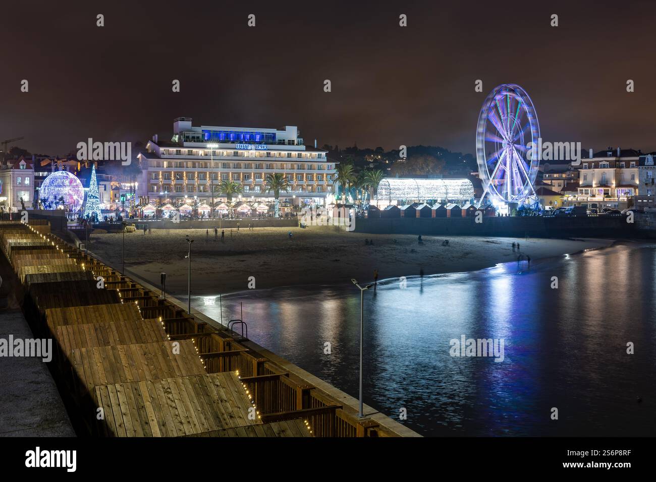 Christmas market at Baía de Cascais at night, Portugal Stock Photo - Alamy