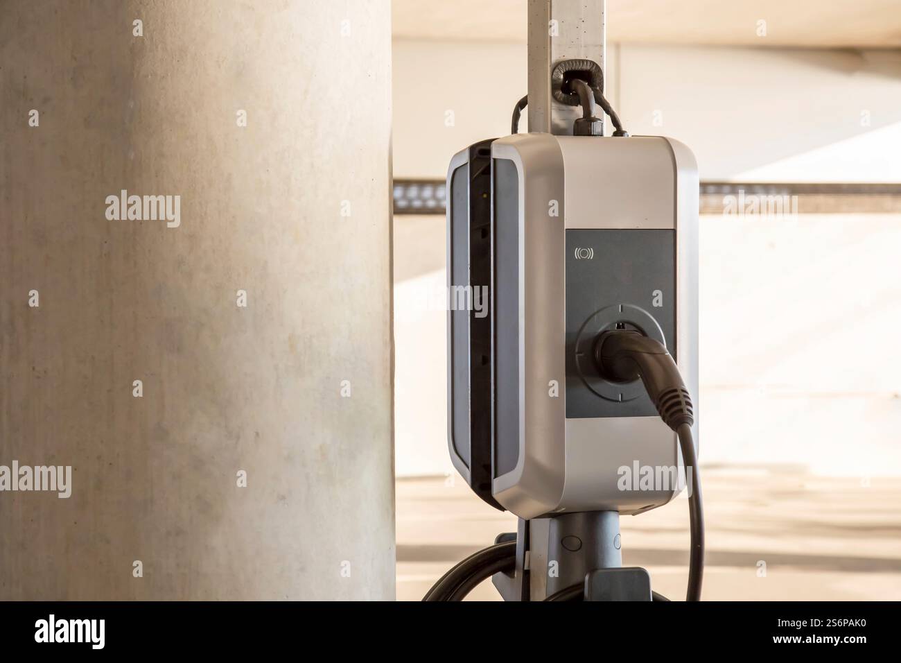 Petrol pump for electric cars Stock Photo - Alamy