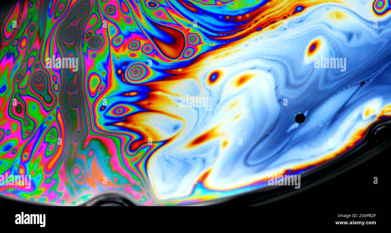 colorful streaks on the soap skin caused by Newton rings and light ...