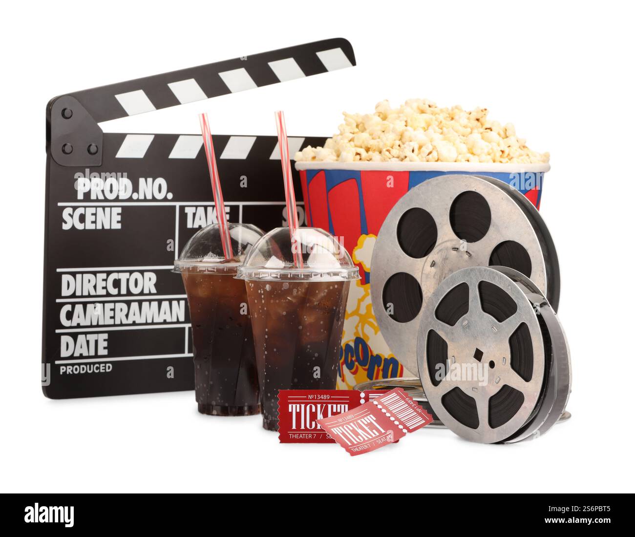 Tasty popcorn, film reels, clapper, soda drinks and movie tickets ...