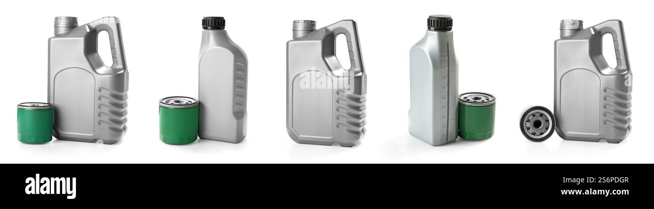 Set of canisters with car oil on white background Stock Photo - Alamy