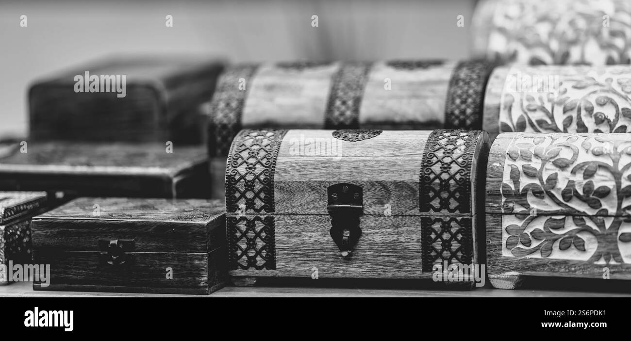 A collection of wooden boxes with different designs and patterns. The ...