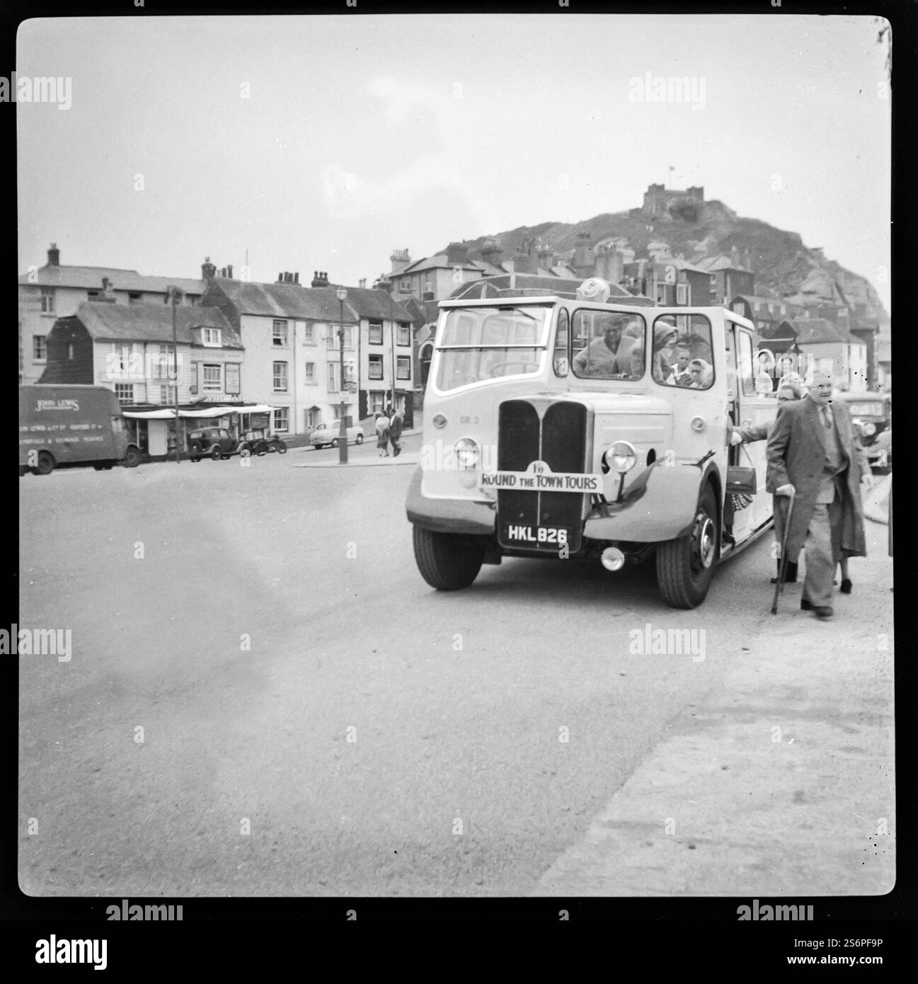 Archive photograph of an open top Round the Town bus tour on the front ...