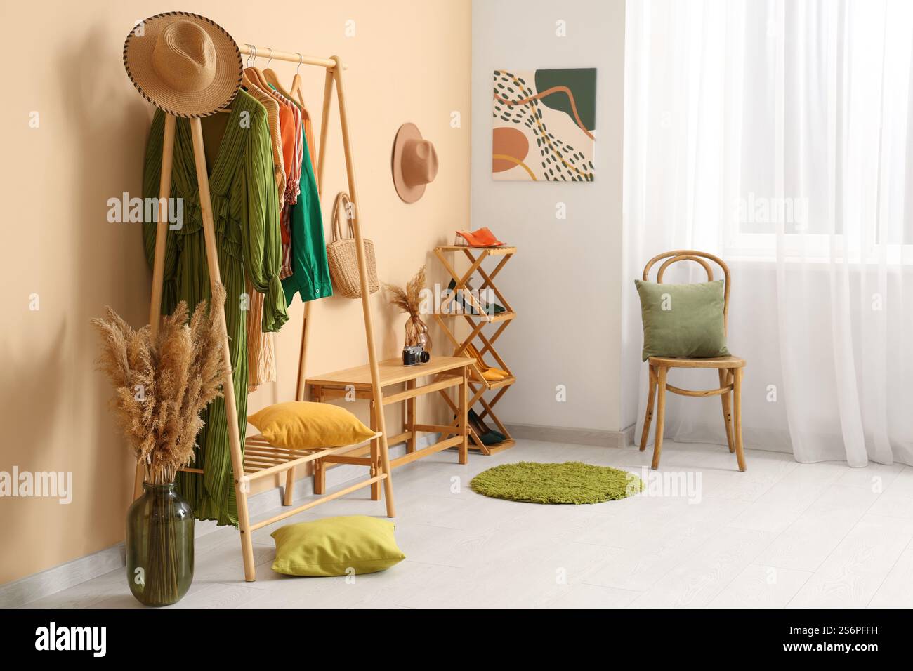 Interior of modern dressing room with rack and shelving unit Stock ...