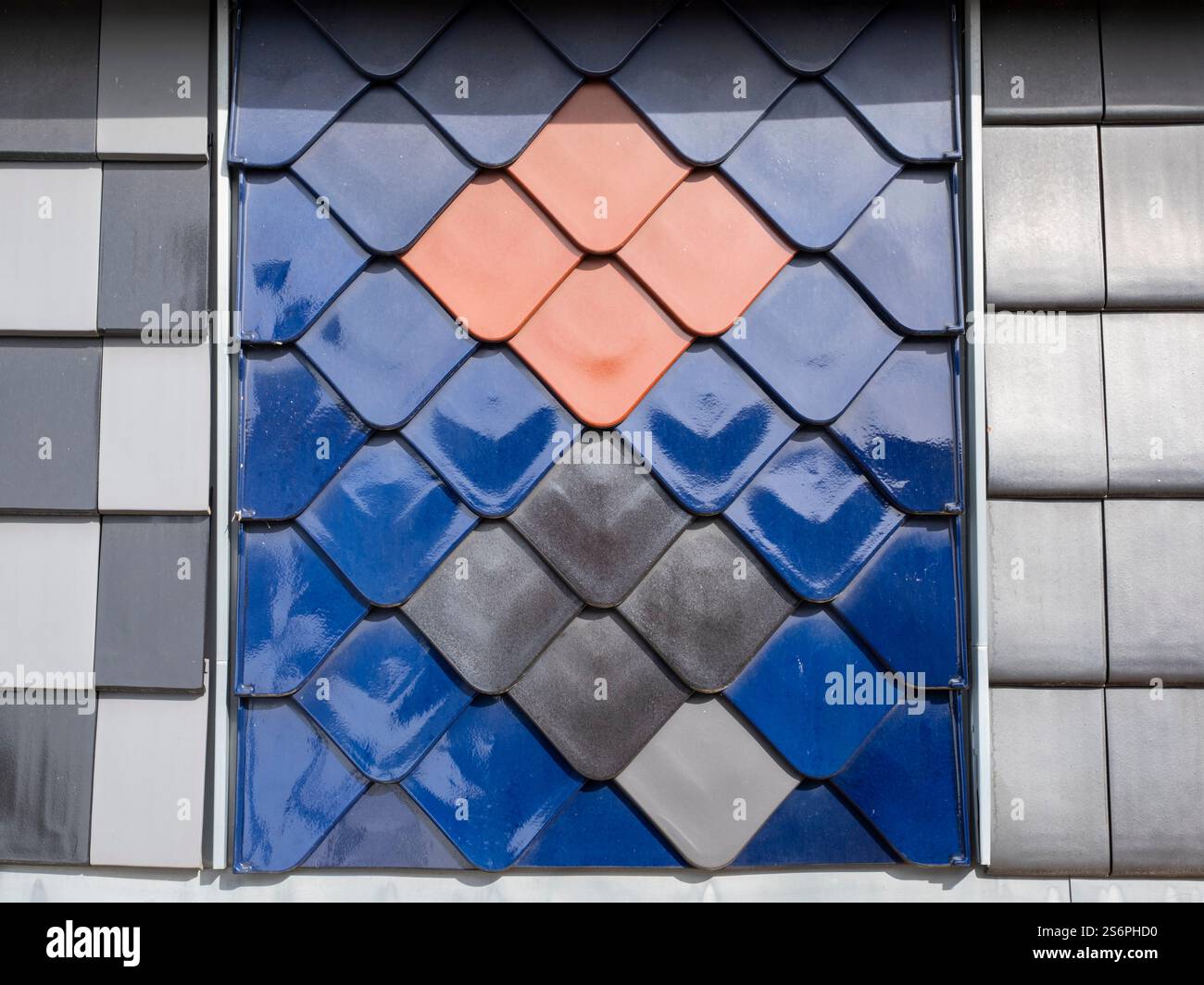 Wall with colored roof tiles Stock Photo - Alamy