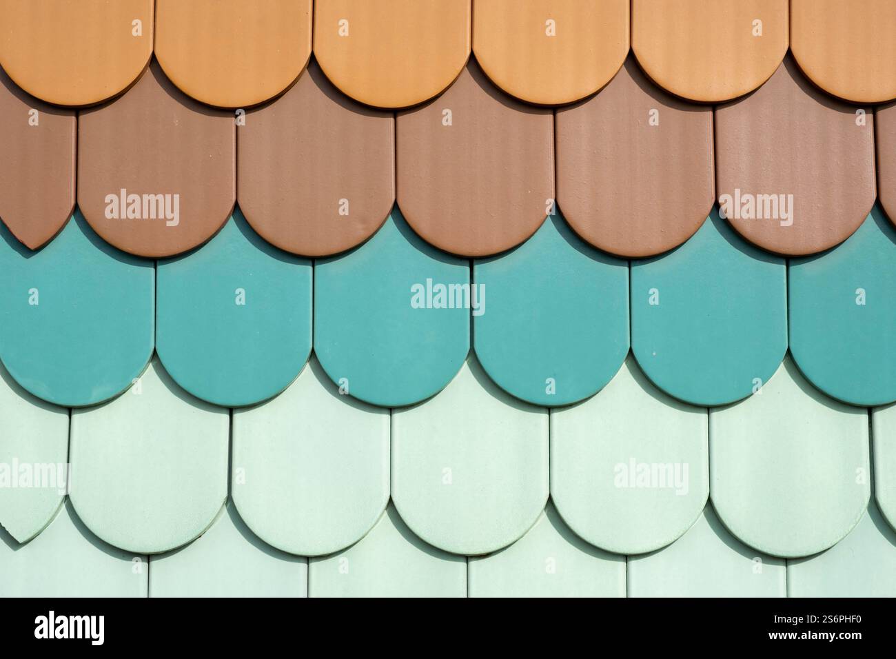 Wall with colored roof tiles Stock Photo - Alamy