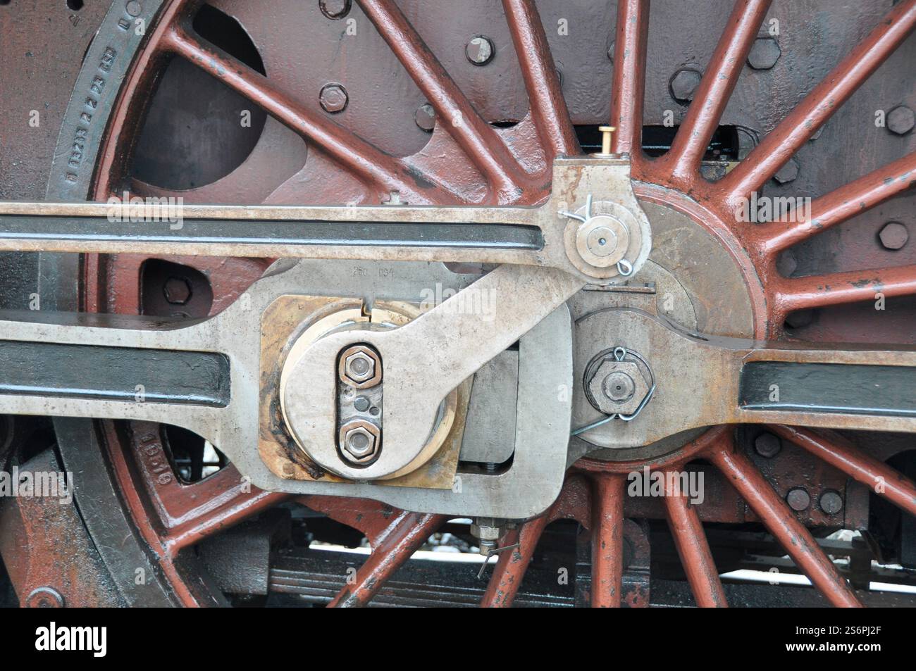 Drive wheel of a steam locomotive with push rod Stock Photo - Alamy