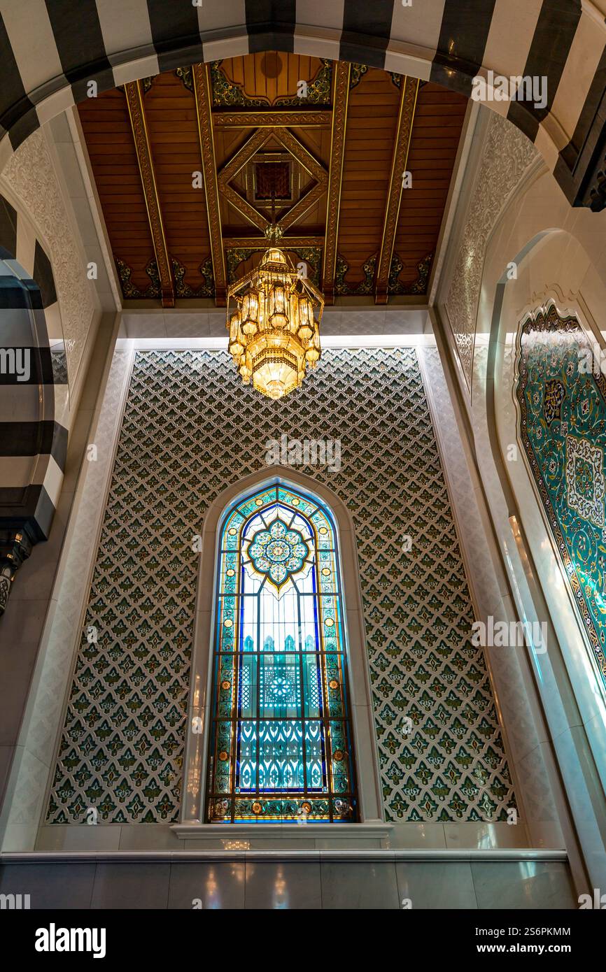 Crystal chandeliers and colorful windows in the main prayer hall hi-res ...