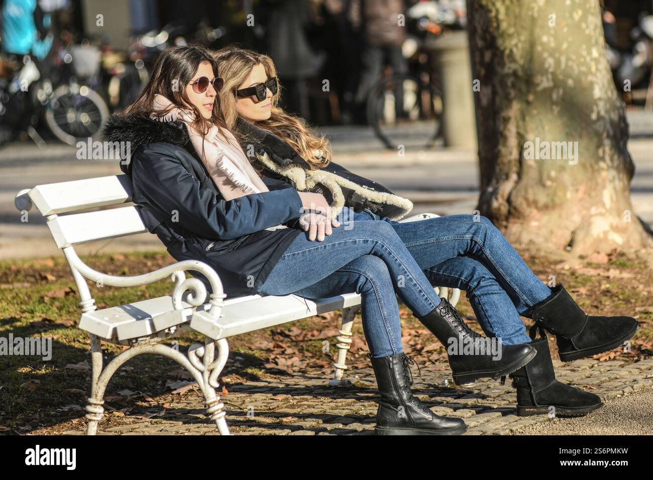 Ljubljana: women talking while sitting o a bench, Congress square. Slovenia Stock Photo - Alamy