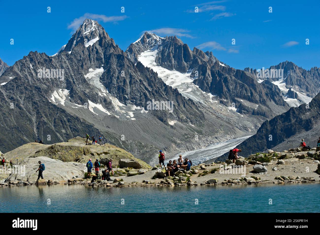 At the mountain lake Lac Blanc, behind it the peaks Aiguille du ...