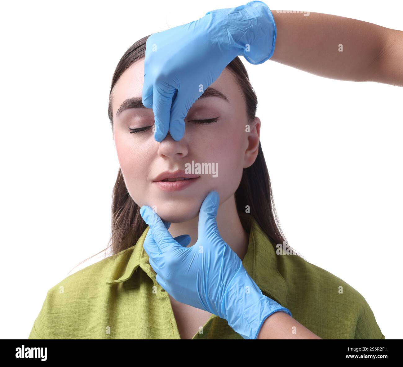 Doctor checking patient's nose before plastic surgery operation on ...