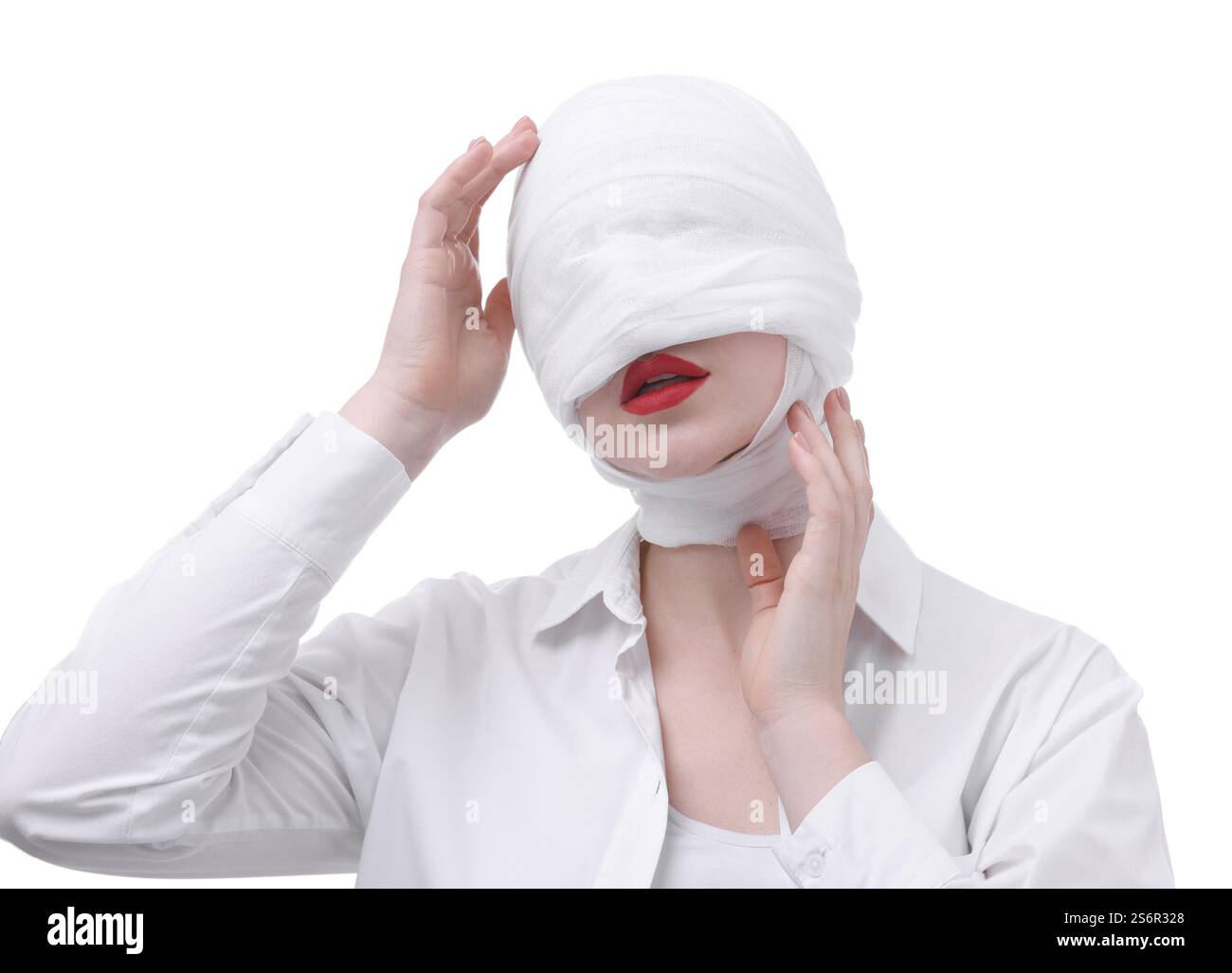 Woman with face wrapped in medical bandage after plastic surgery ...
