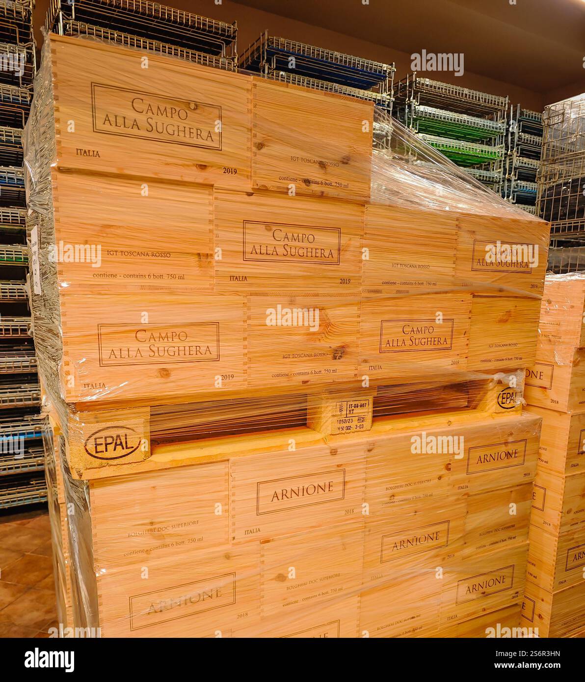 Tuscany, Italy - 01 17 2025. Inside a winery. Wine packed into boxes in ...