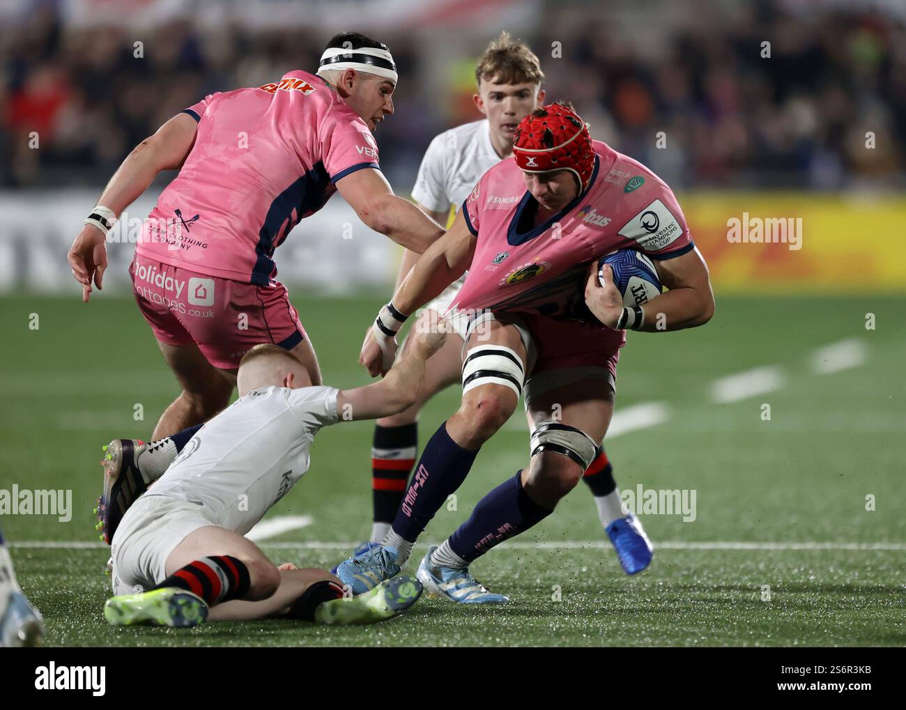 Ulster's Nathan Doak holds on to Exeter Chiefs' Ross Vintcent during ...
