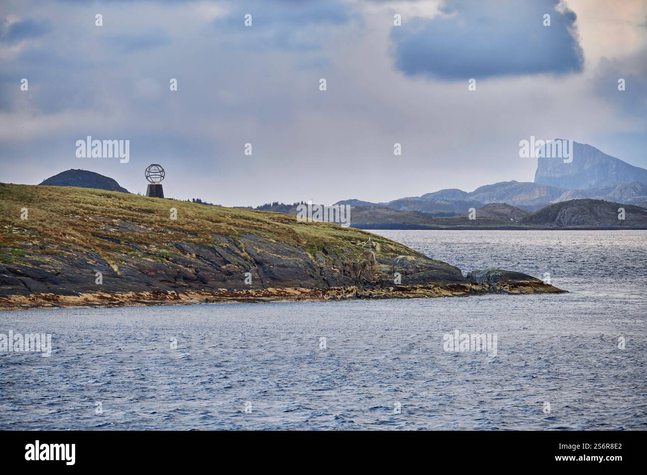 Cruise along the coast of Norway, crossing the Arctic Circle, globe as a monument on the small ...