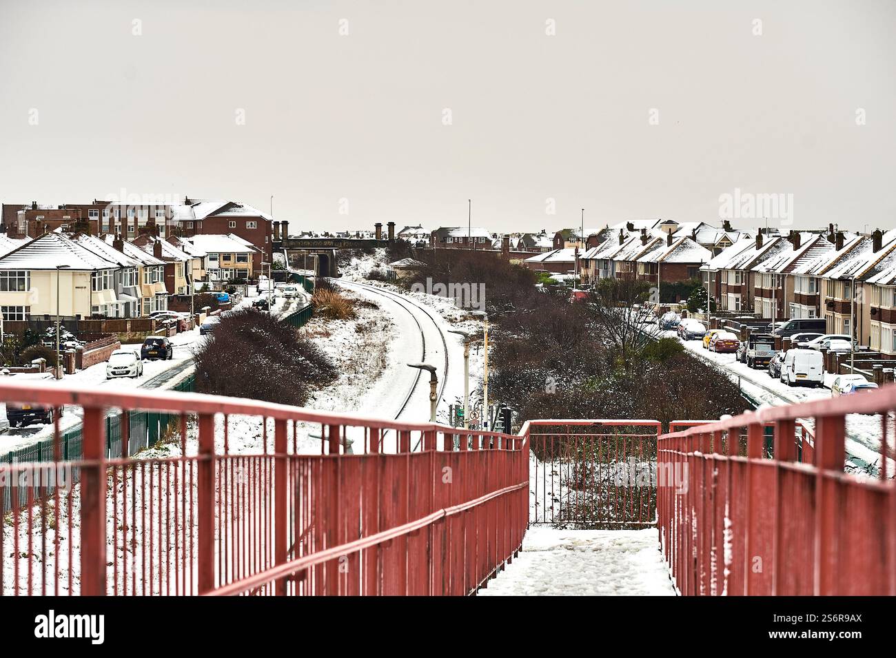 A snow covered Blackpool south viewed from the footbridge over the ...