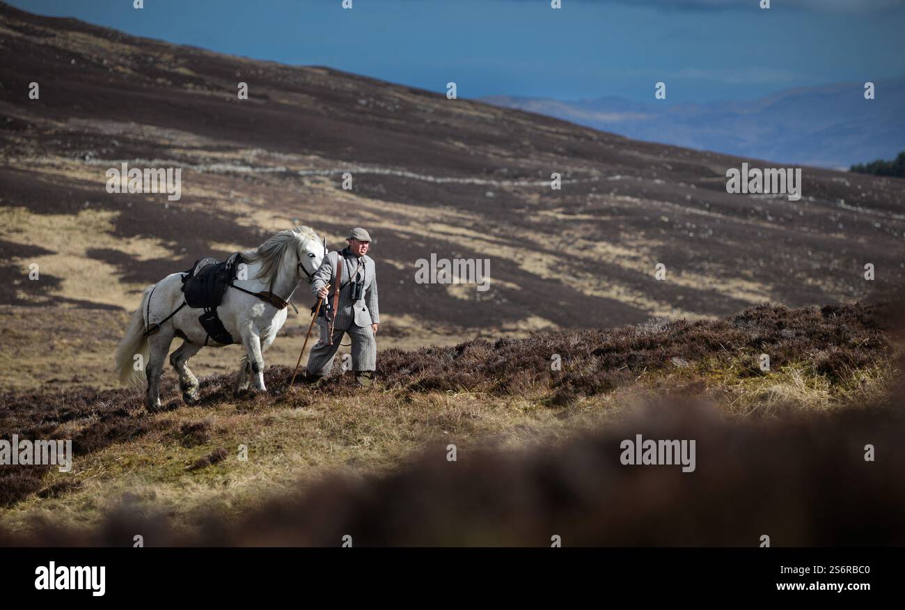 Game keeper on the Atholl Estate with pony which he would use to carry ...